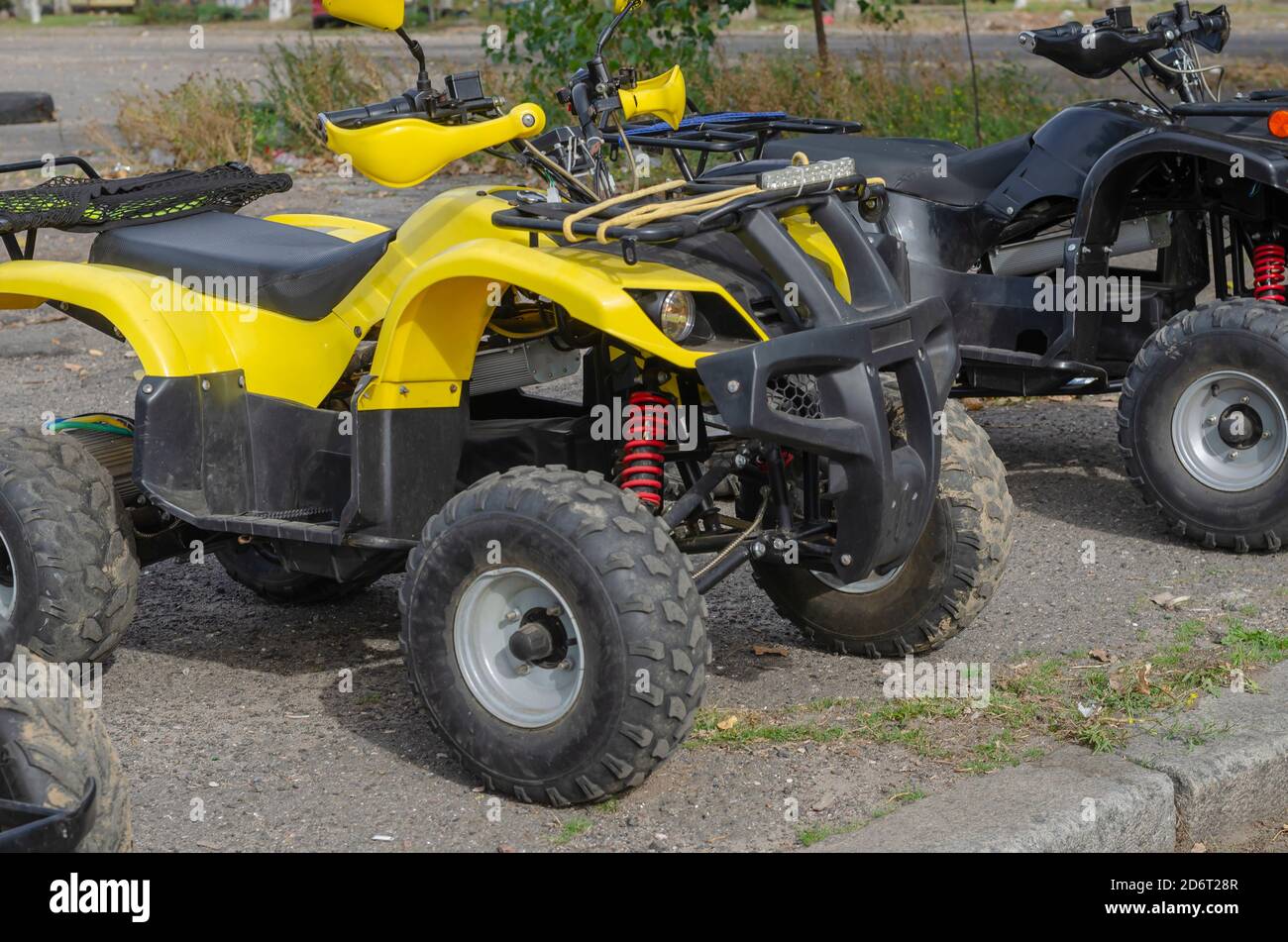 Group of random quad bikes in line outdoors. Rent of transport for off ...