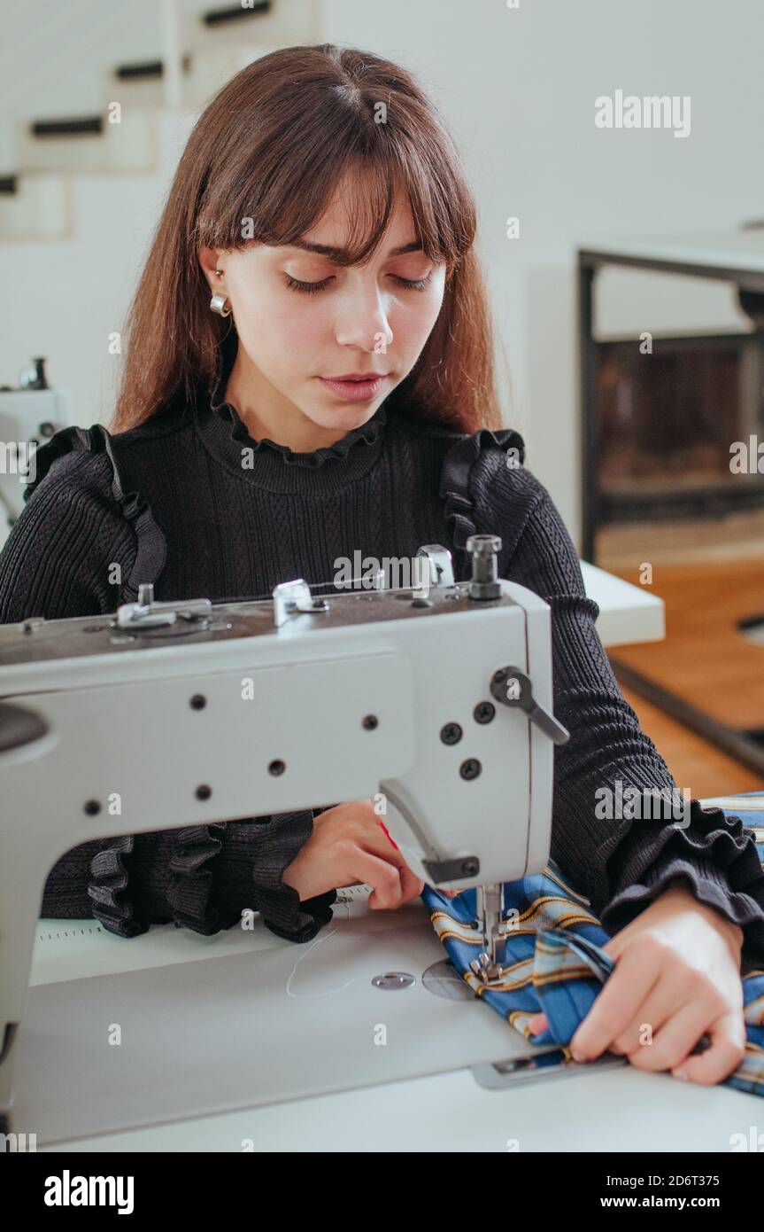 Girl sewing machine dress woman fashion hi-res stock photography and ...