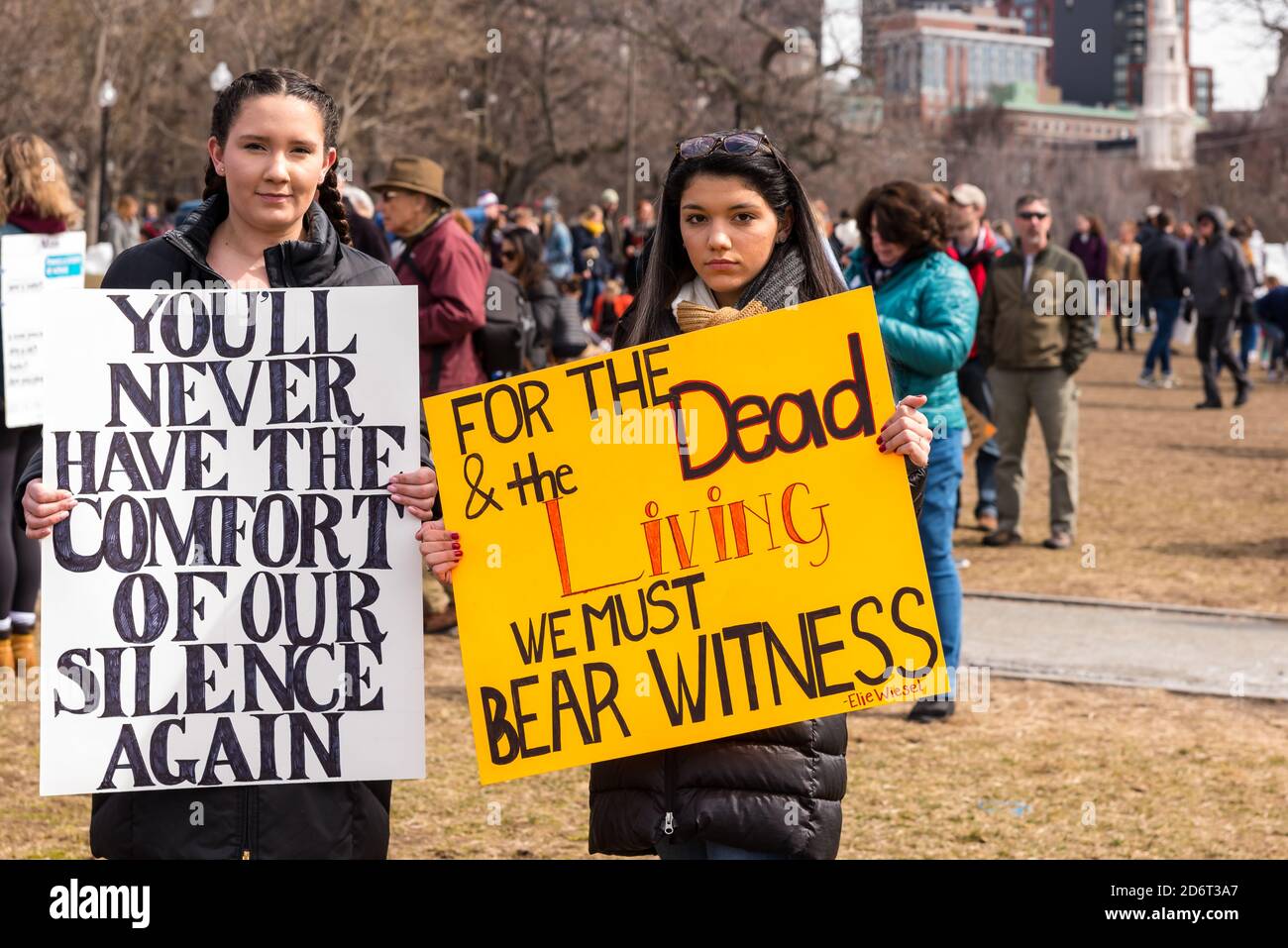 Two girls holding handmade signs at the March for Our Lives to protest ...