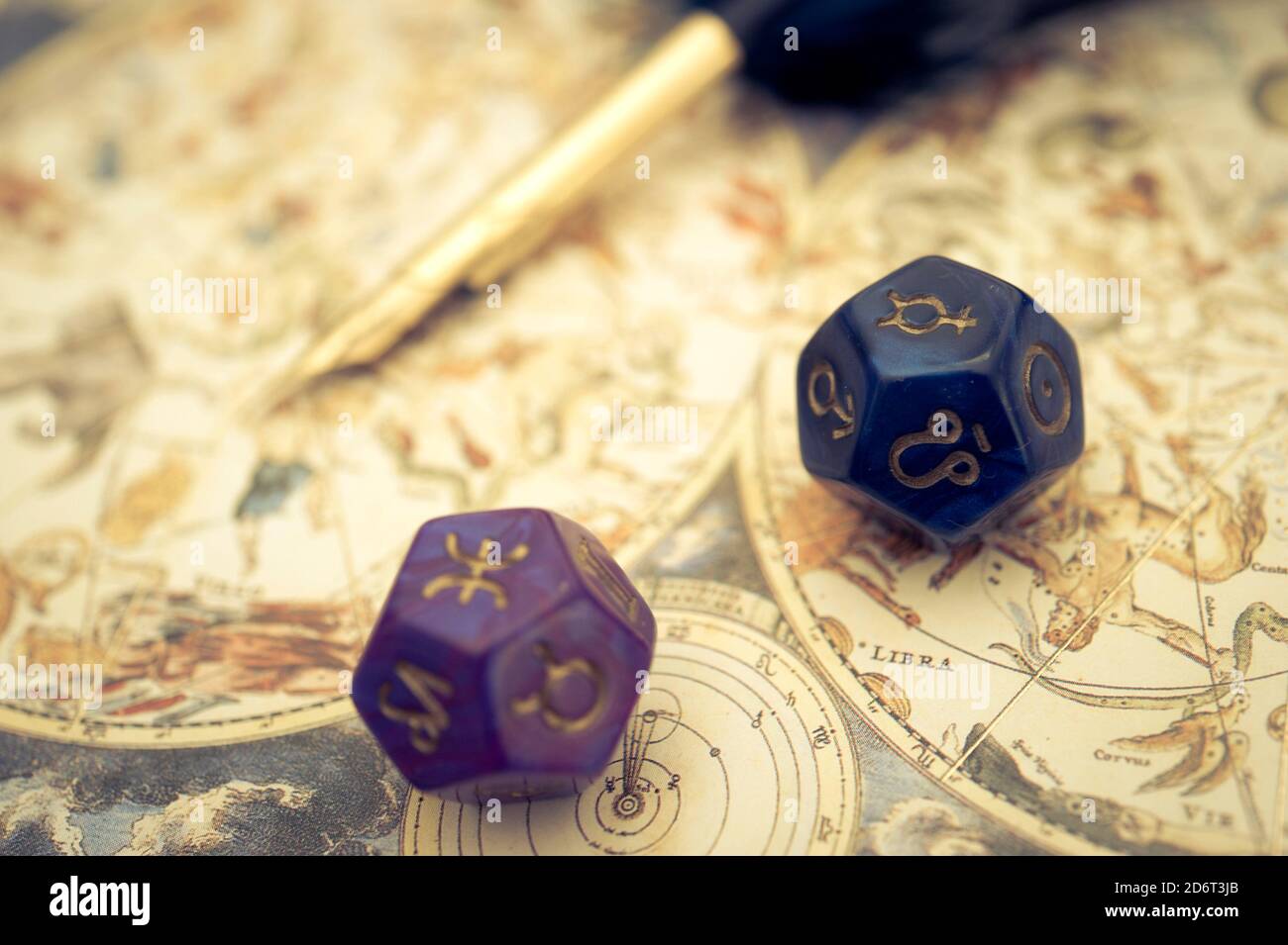 antique astrology chart with zodiac signs, dice and quill pen Stock ...