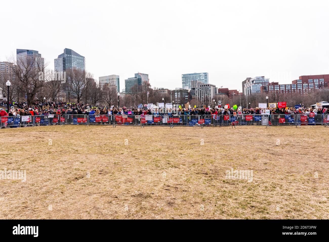 Large crowd of protesters waiting behind the barriers at the March for ...