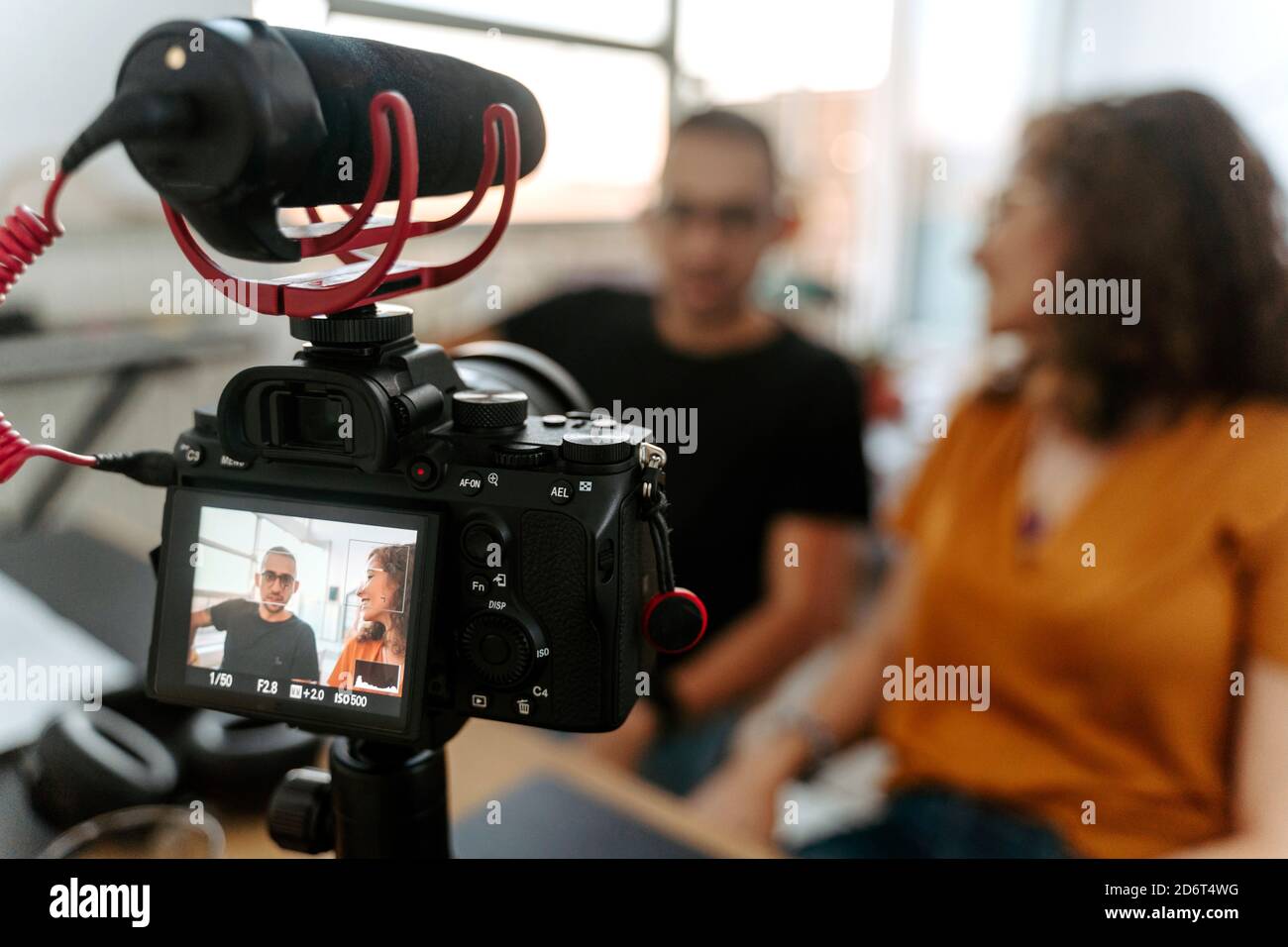 Man interview microphone woman hi-res stock photography and images - Alamy