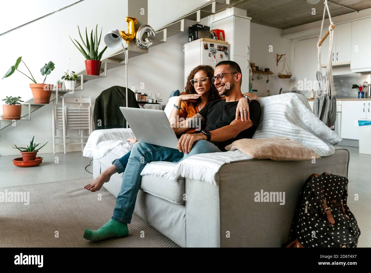 Couple Cuddling Watching A Movie