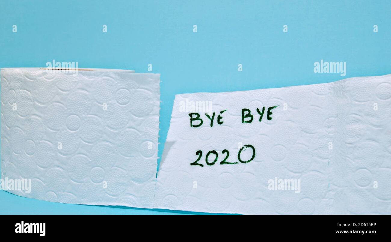 Bye Bye 2020 text on the toilet paper. Tear of last side of paper ...