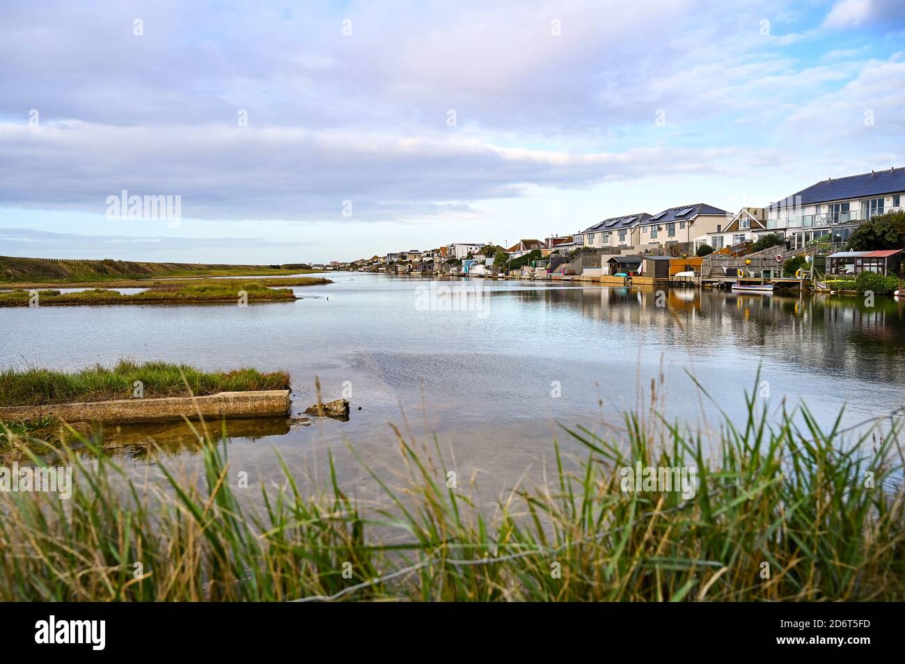 Lancing Widewater Lagoon nature reserve with homes overlooking the ...