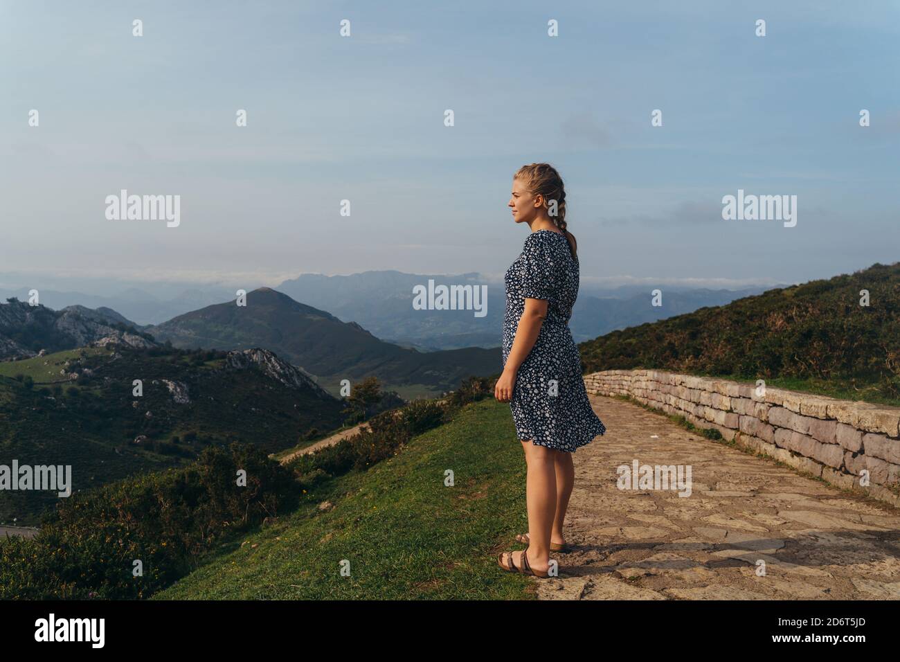 Side view full body young positive female impressed by amazing ...