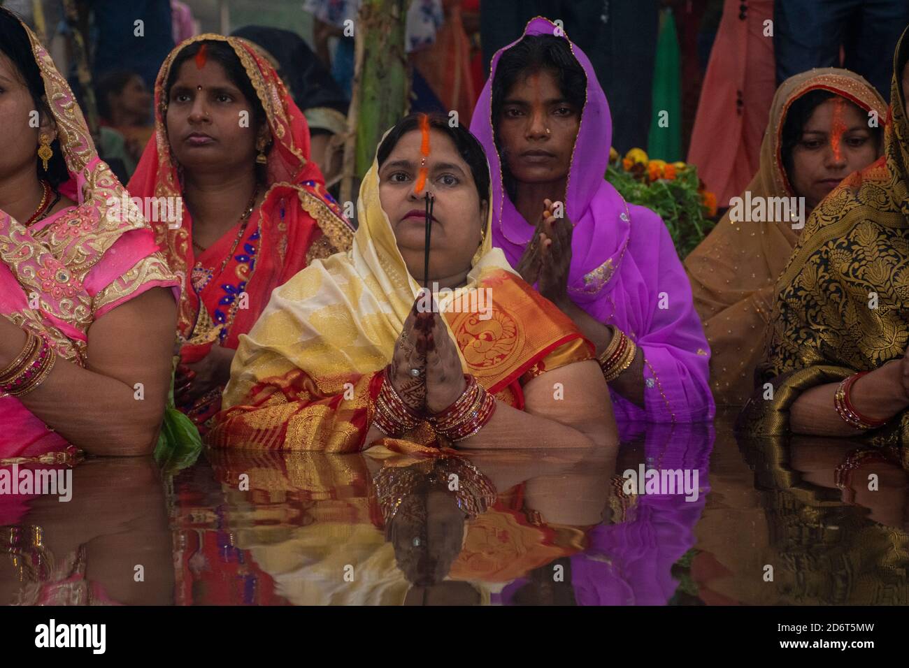 Indian women performing chhath pooja.Chhath is an ancient Hindu Vedic ...