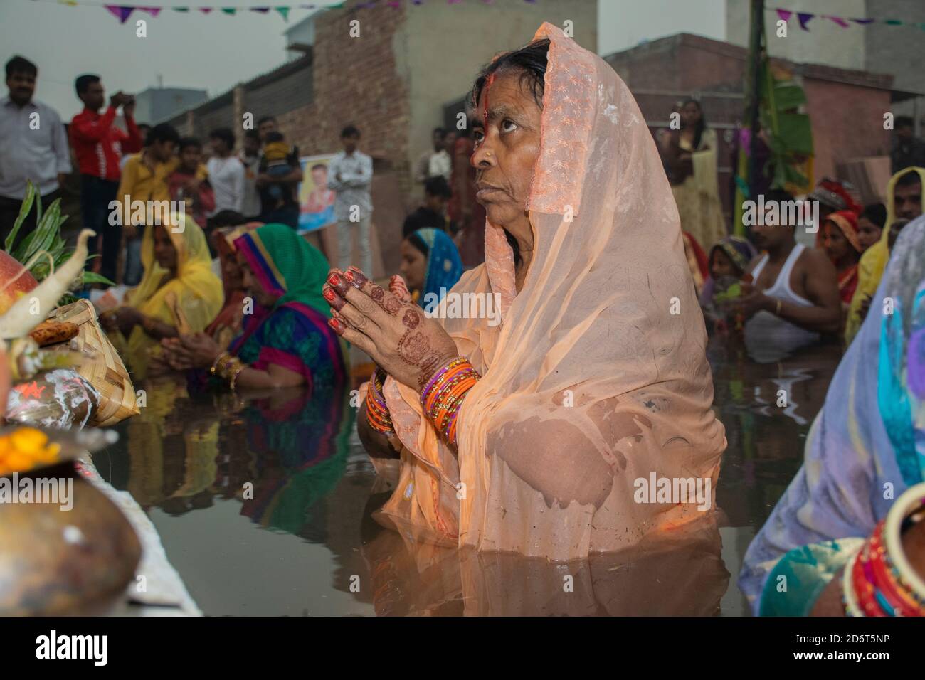 Indian women performing chhath pooja.Chhath is an ancient Hindu Vedic ...