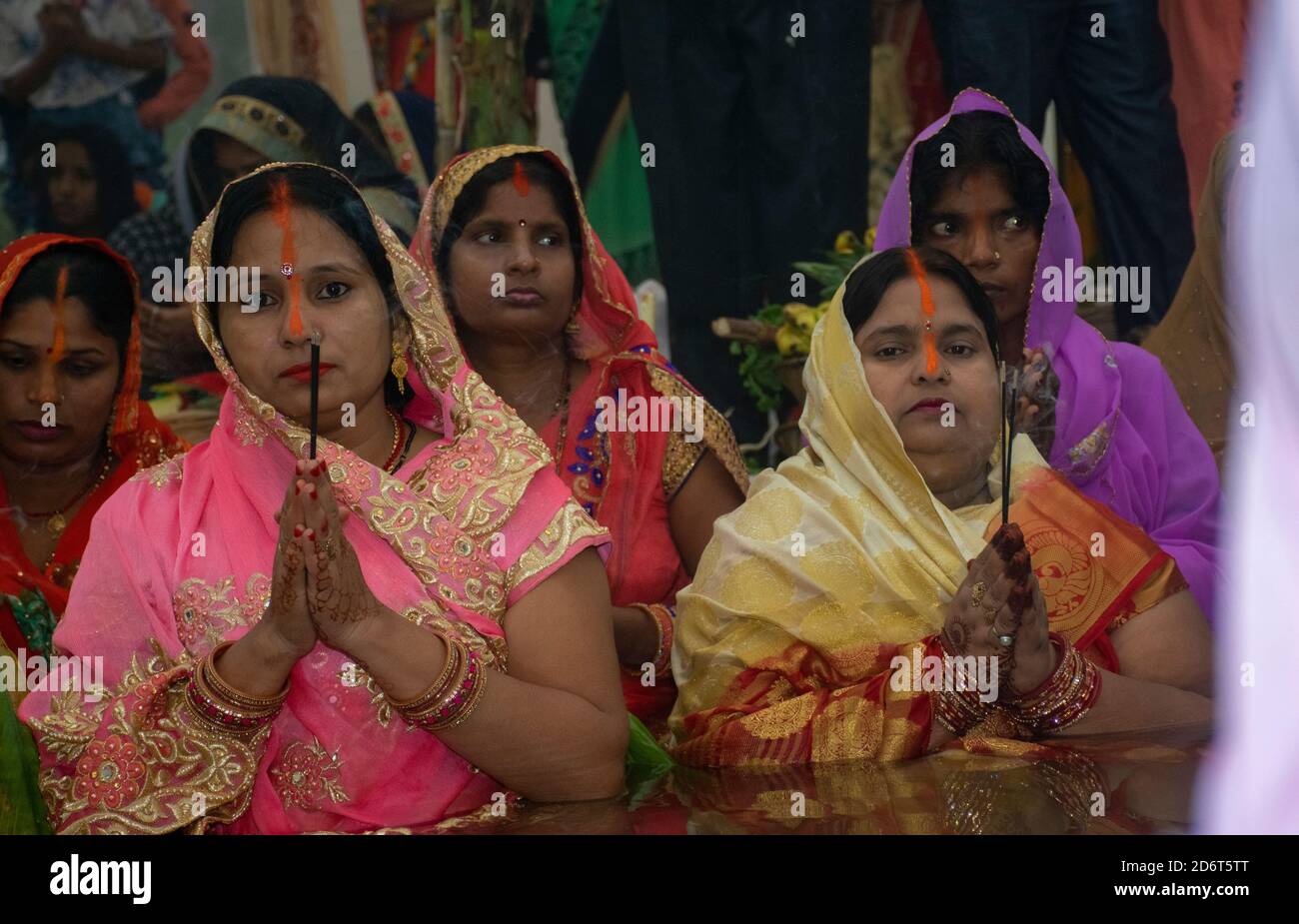 Indian women performing chhath pooja.Chhath is an ancient Hindu Vedic ...