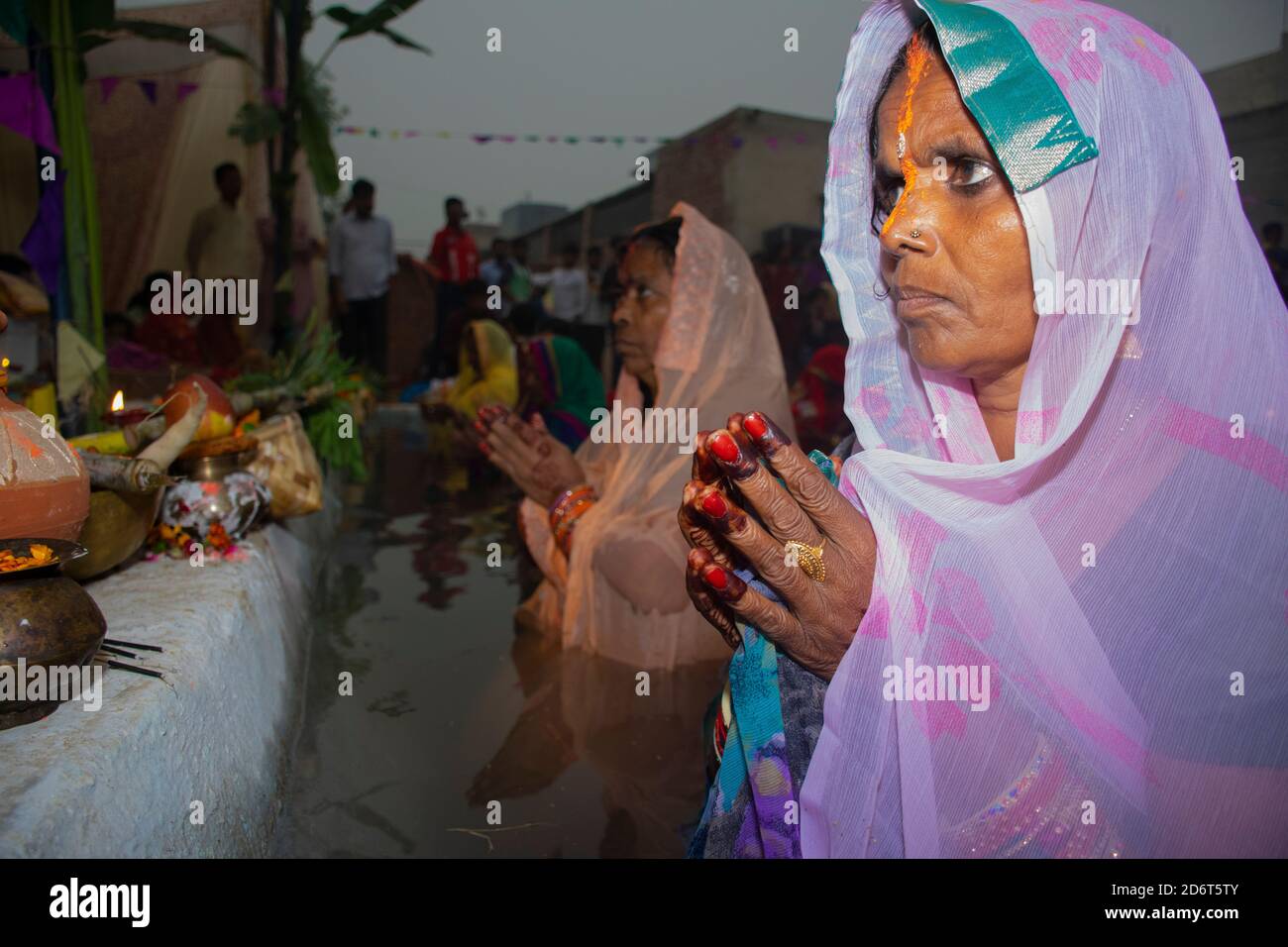 Indian women performing chhath pooja.Chhath is an ancient Hindu Vedic ...