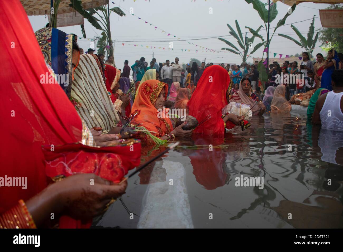 Indian women performing chhath pooja.Chhath is an ancient Hindu Vedic ...