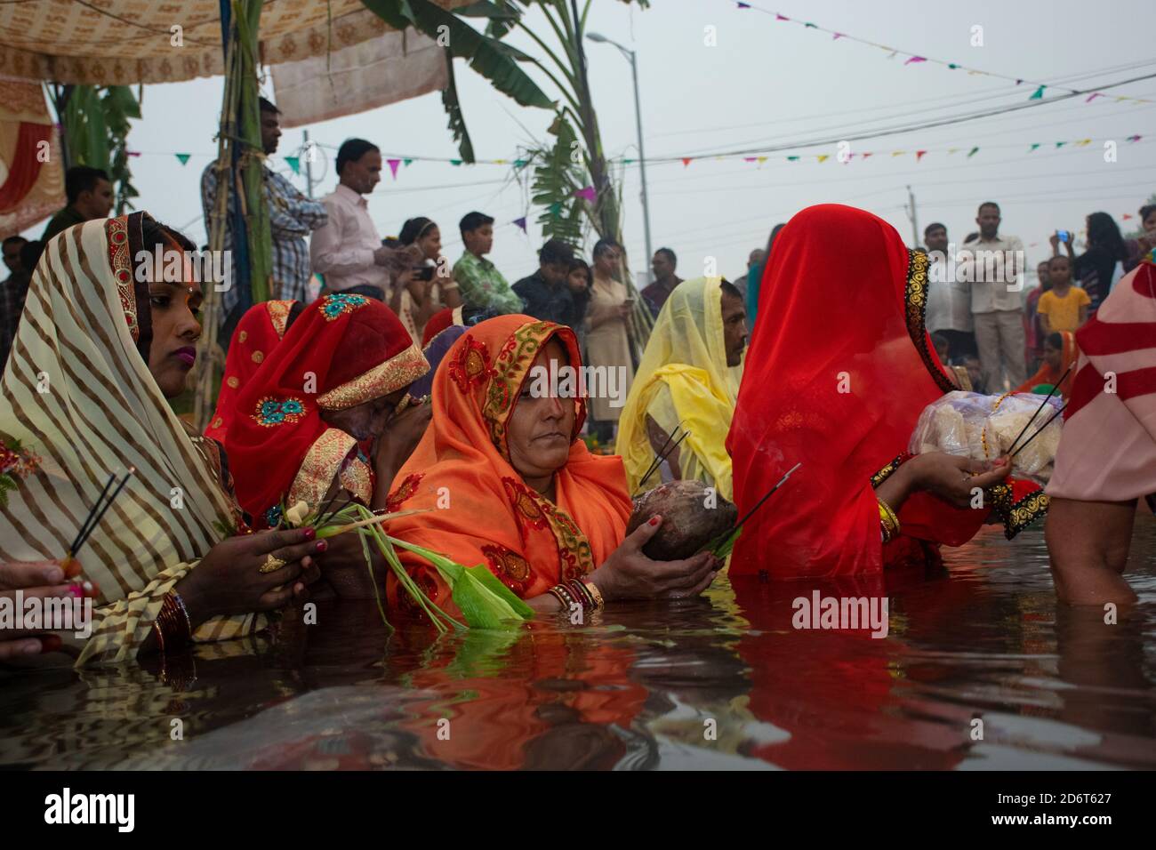 Indian women performing chhath pooja.Chhath is an ancient Hindu Vedic ...