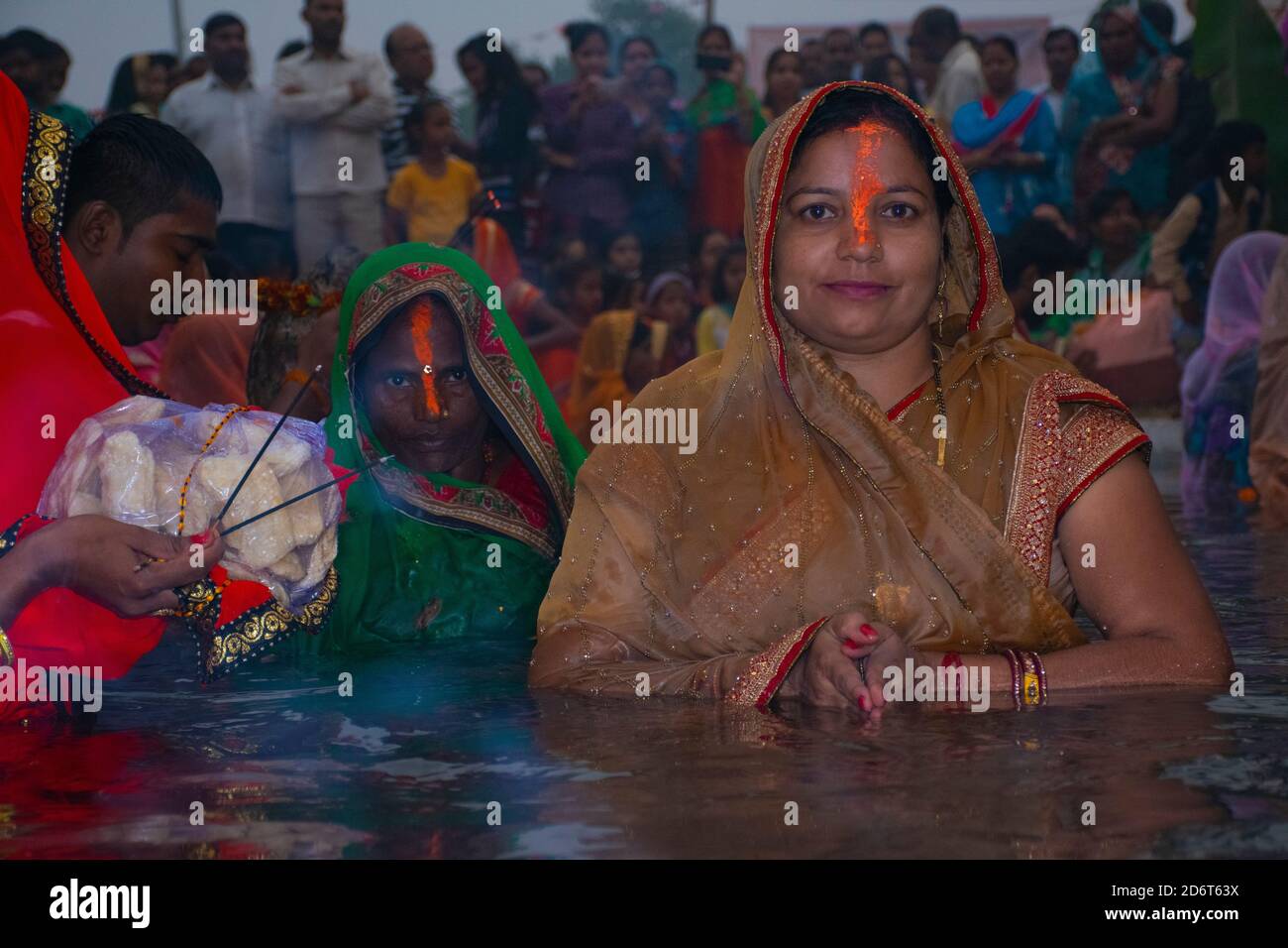 Indian women performing chhath pooja.Chhath is an ancient Hindu Vedic ...