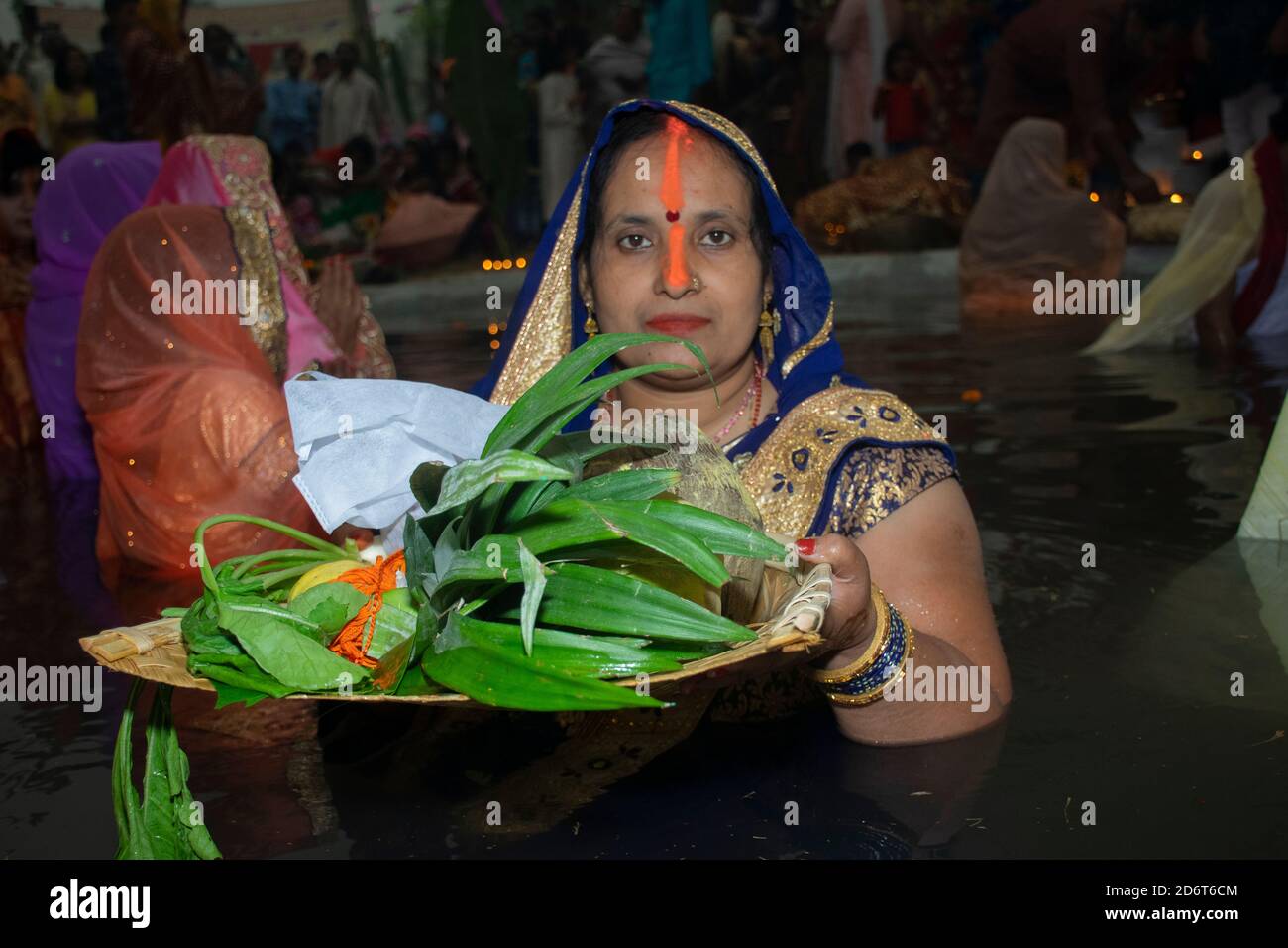 Indian women performing chhath pooja.Chhath is an ancient Hindu Vedic ...