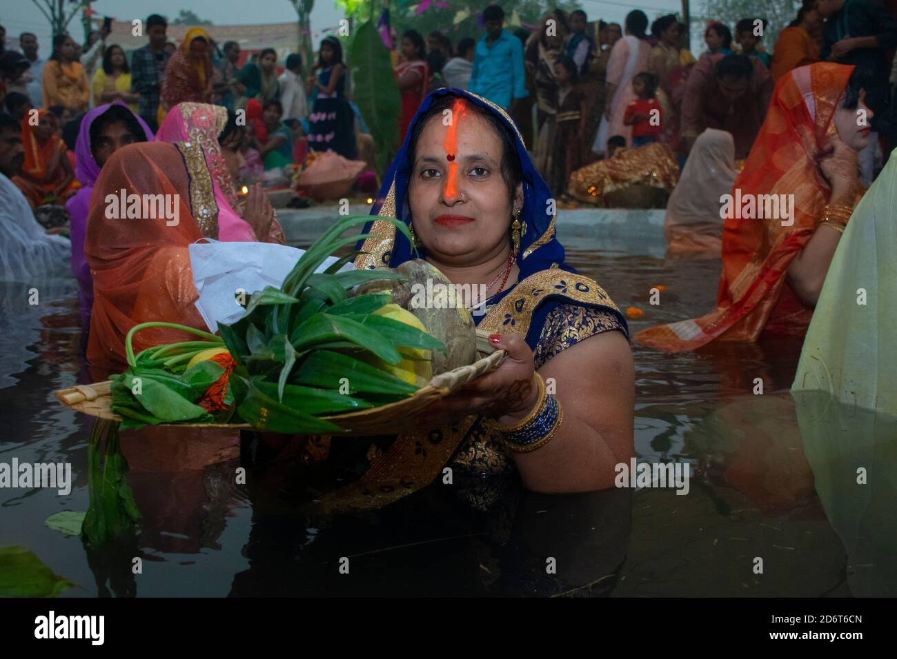 Indian women performing chhath pooja.Chhath is an ancient Hindu Vedic ...