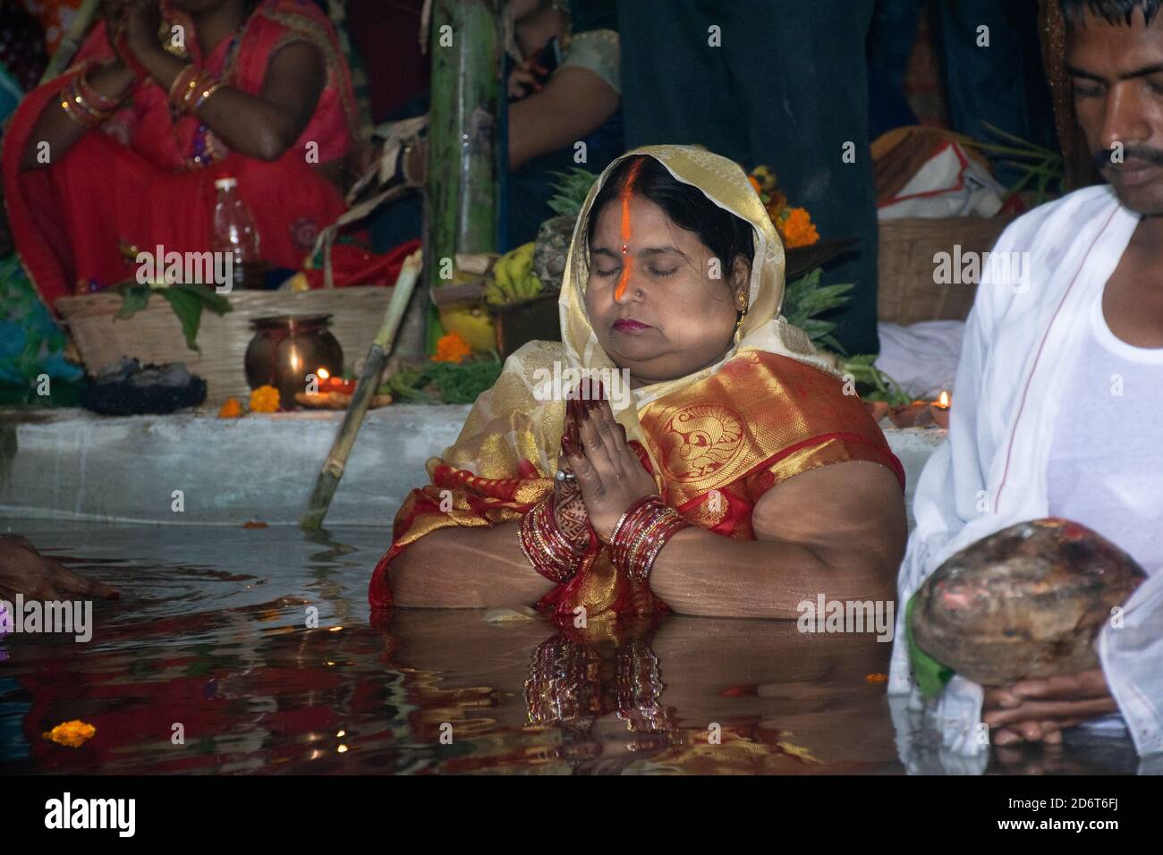 Indian women performing chhath pooja.Chhath is an ancient Hindu Vedic ...