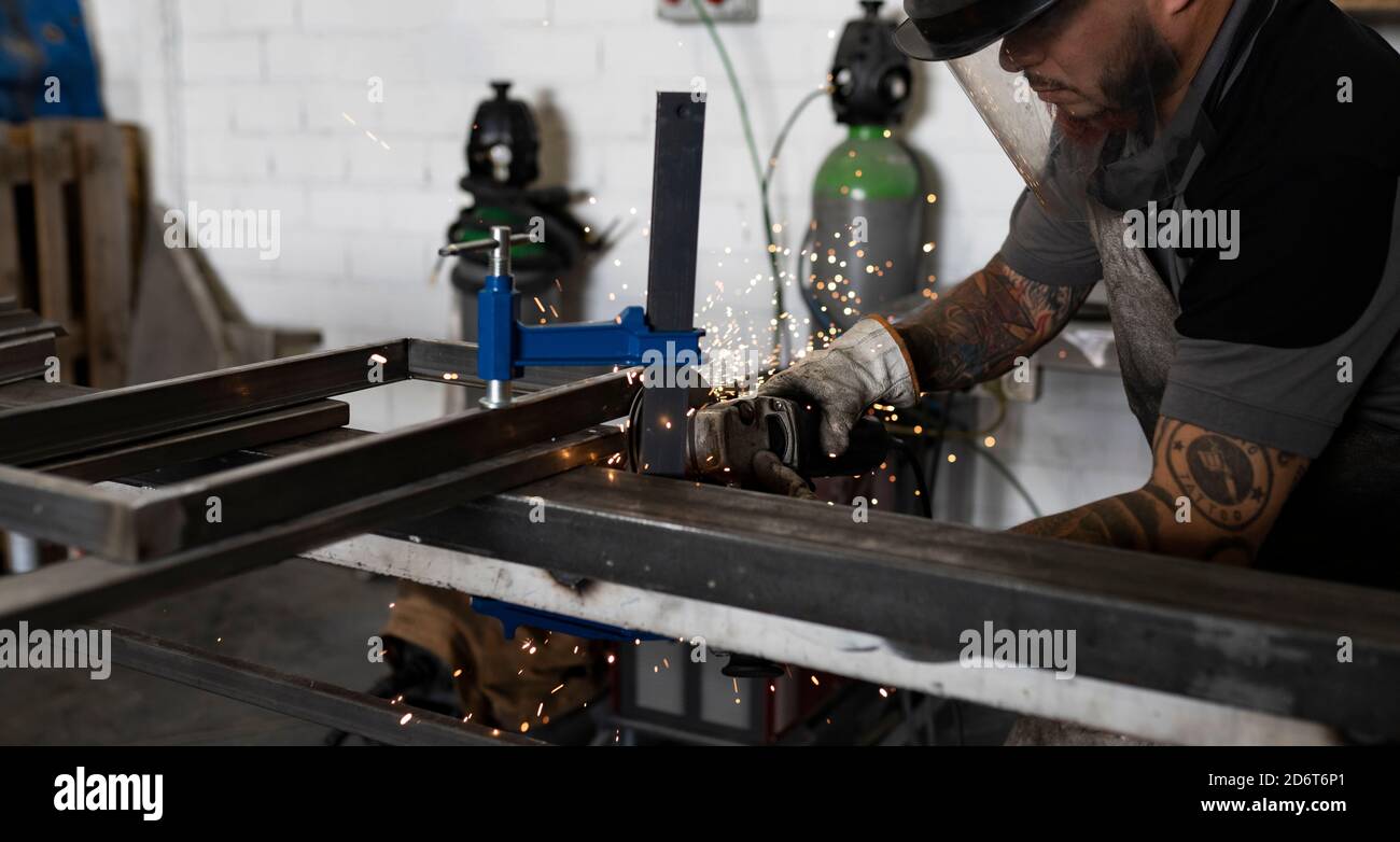 Side view serious male welder hi-res stock photography and images - Alamy