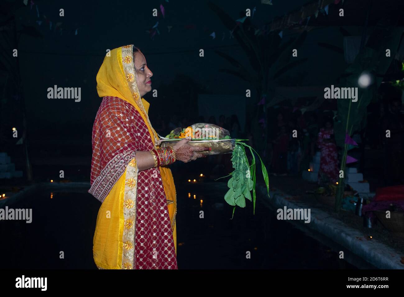 Indian women performing chhath pooja.Chhath is an ancient Hindu Vedic ...