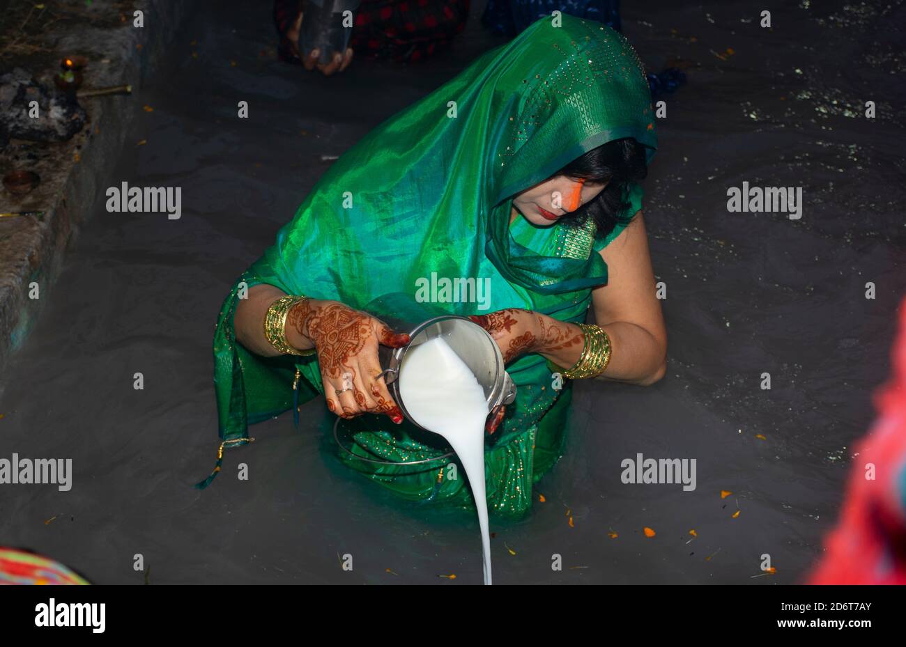 Indian women performing chhath pooja.Chhath is an ancient Hindu Vedic ...