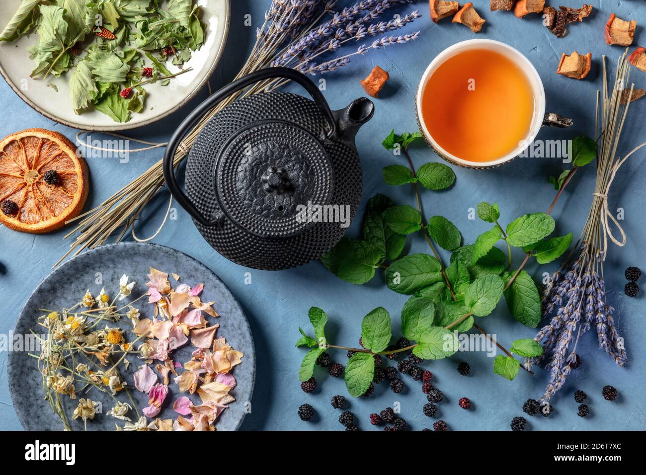 Herbal tea, natural, organic, and healthy, a tea pot, cup, and a ...