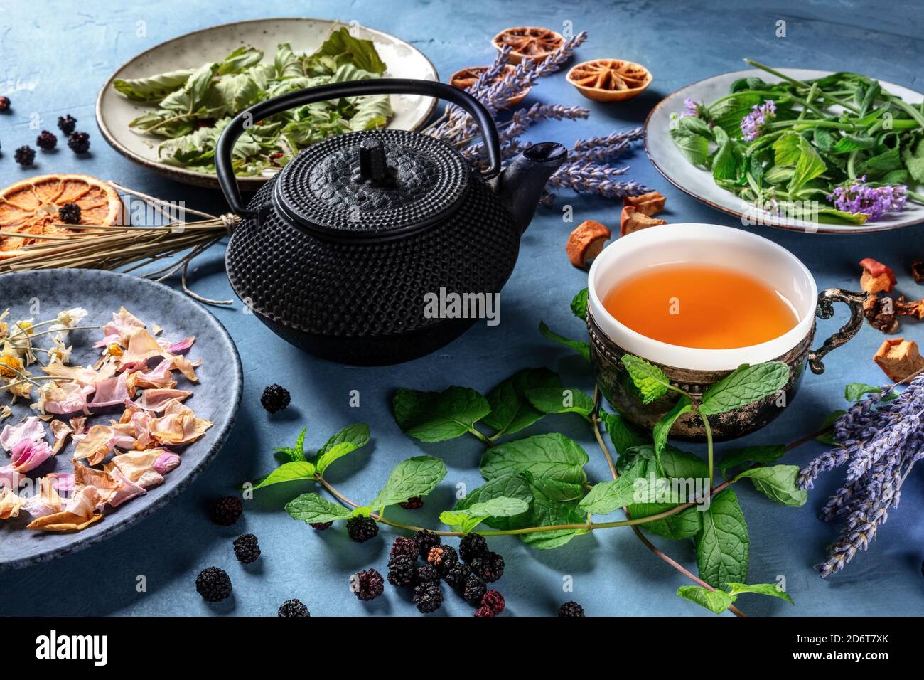 Herbal tea, natural, organic, and healthy. A tea cup, pot, and many ...