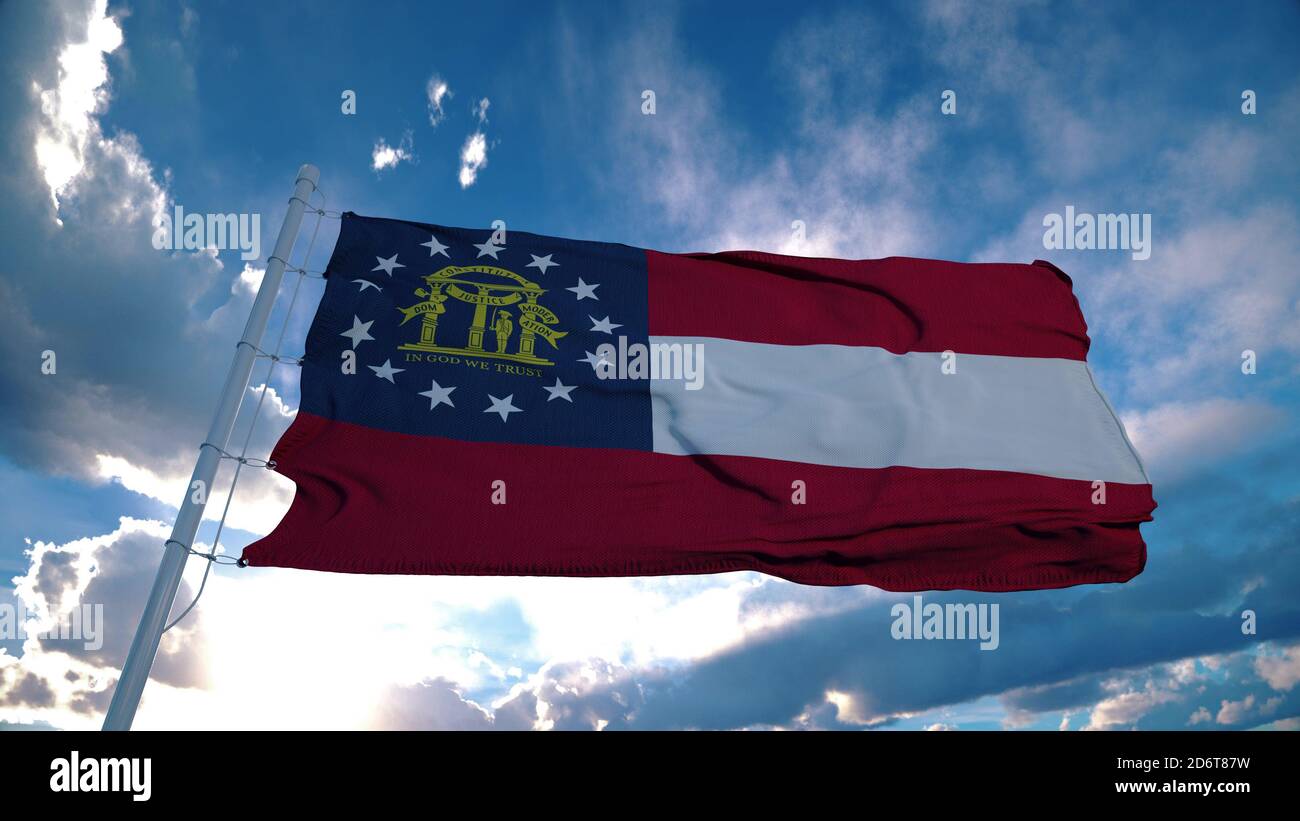 Georgia flag on a flagpole waving in the wind in the sky. State of ...