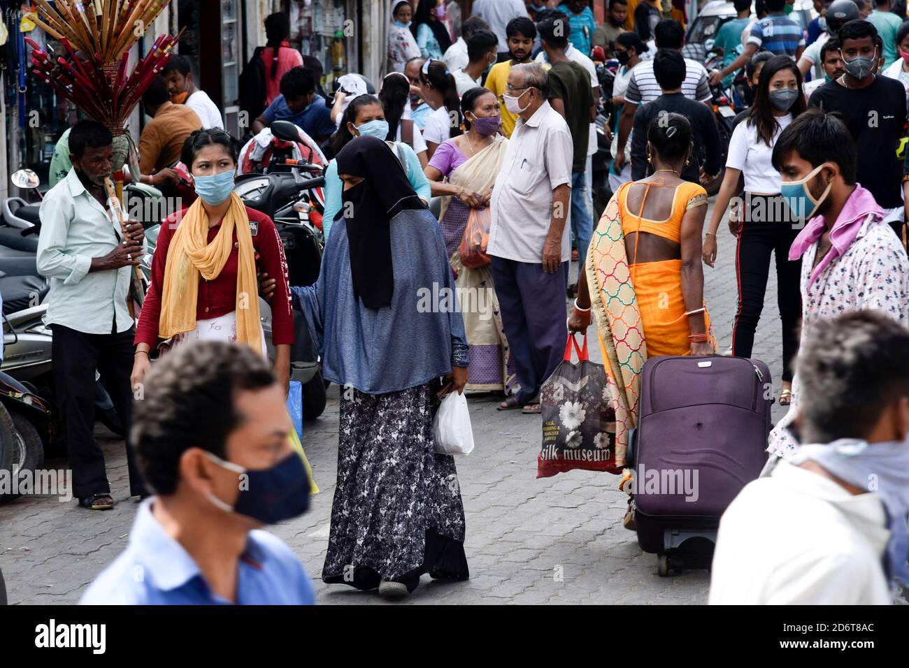 Guwahati, Assam, India. 19th Oct, 2020. Peoples crowd in a market at ...