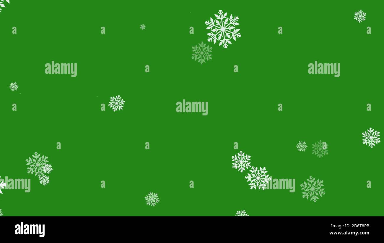 Isolated falling cartoon snow on green screen Stock Photo - Alamy