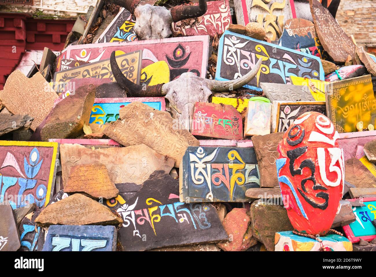 Pile of colourful concrete blocks with oriental inscriptions in ...