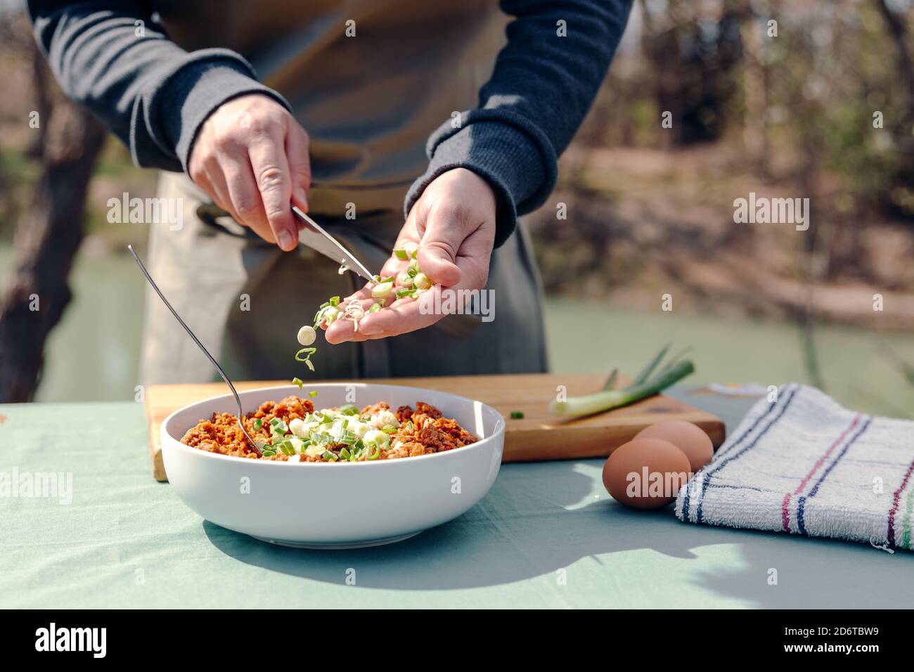 Ground level of full body of male in casual wear performing stunt on ...