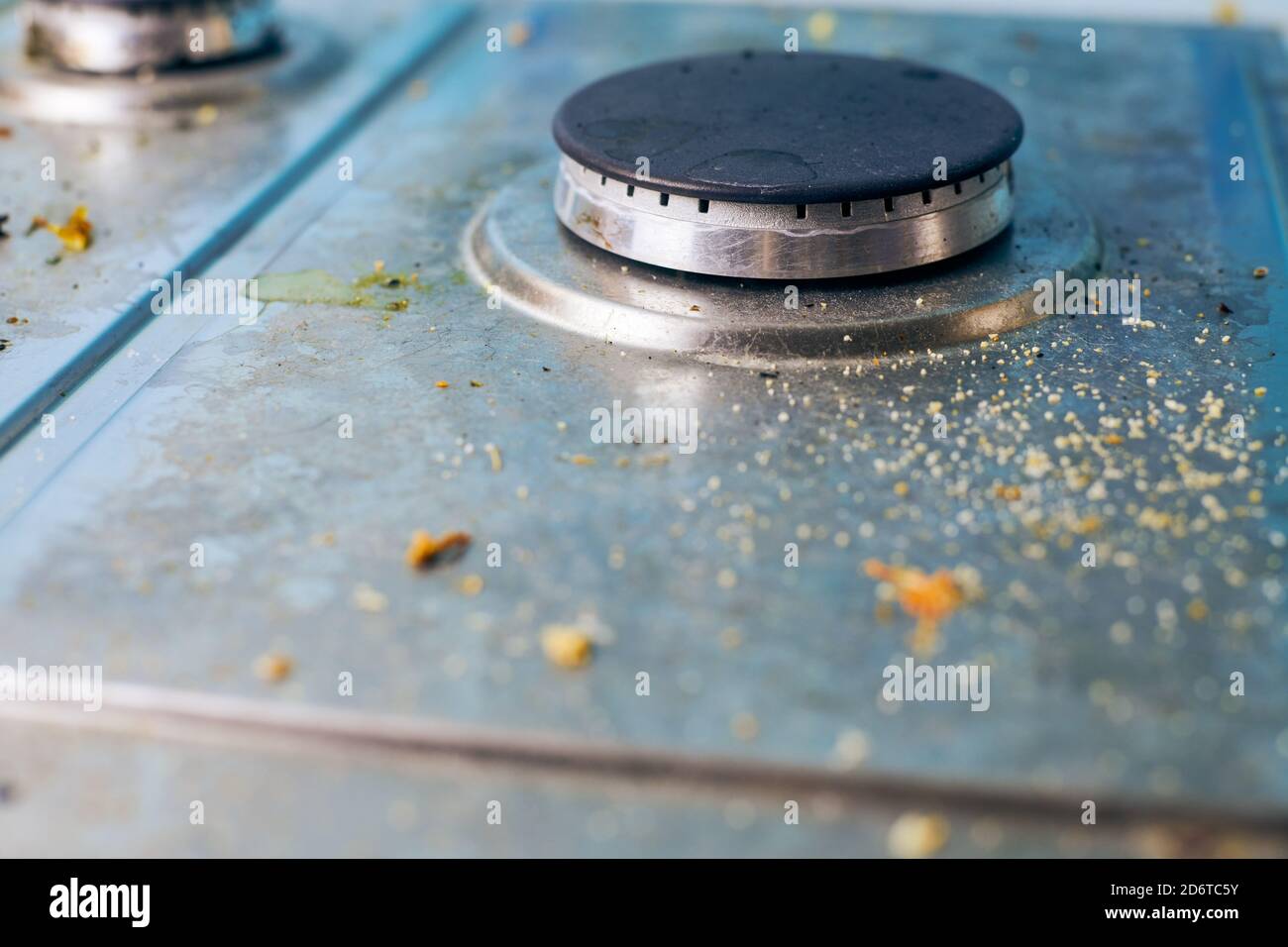 Dirty stove top with oil splatters, fat stains and food leftovers ...