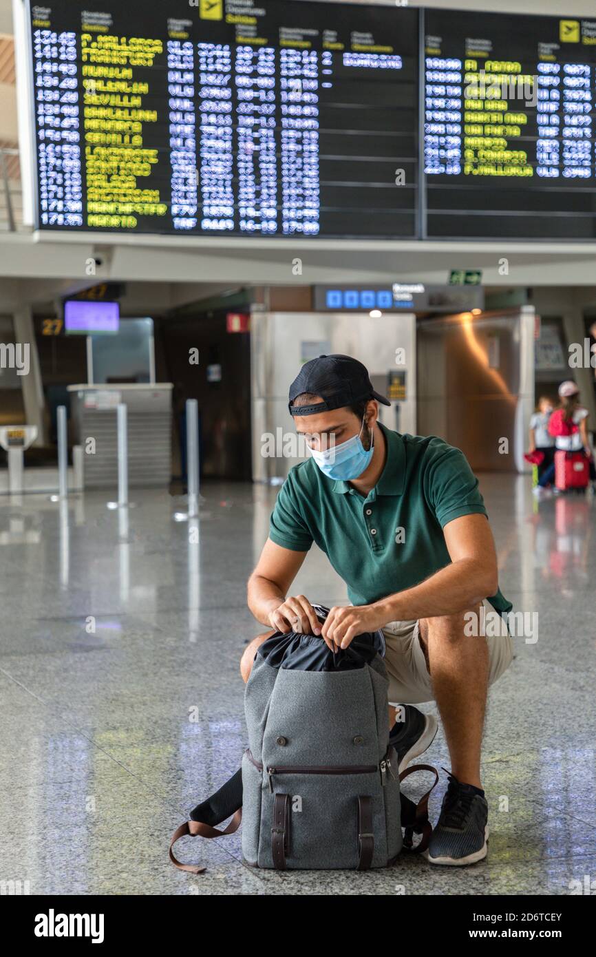 Male tourist squatting on hi-res stock photography and images - Alamy