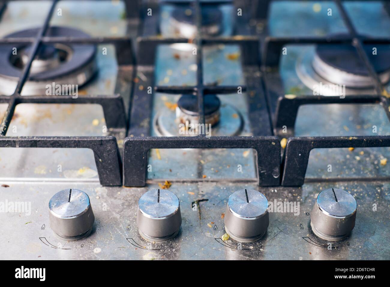 Dirty stove top with oil splatters, fat stains and food leftovers ...