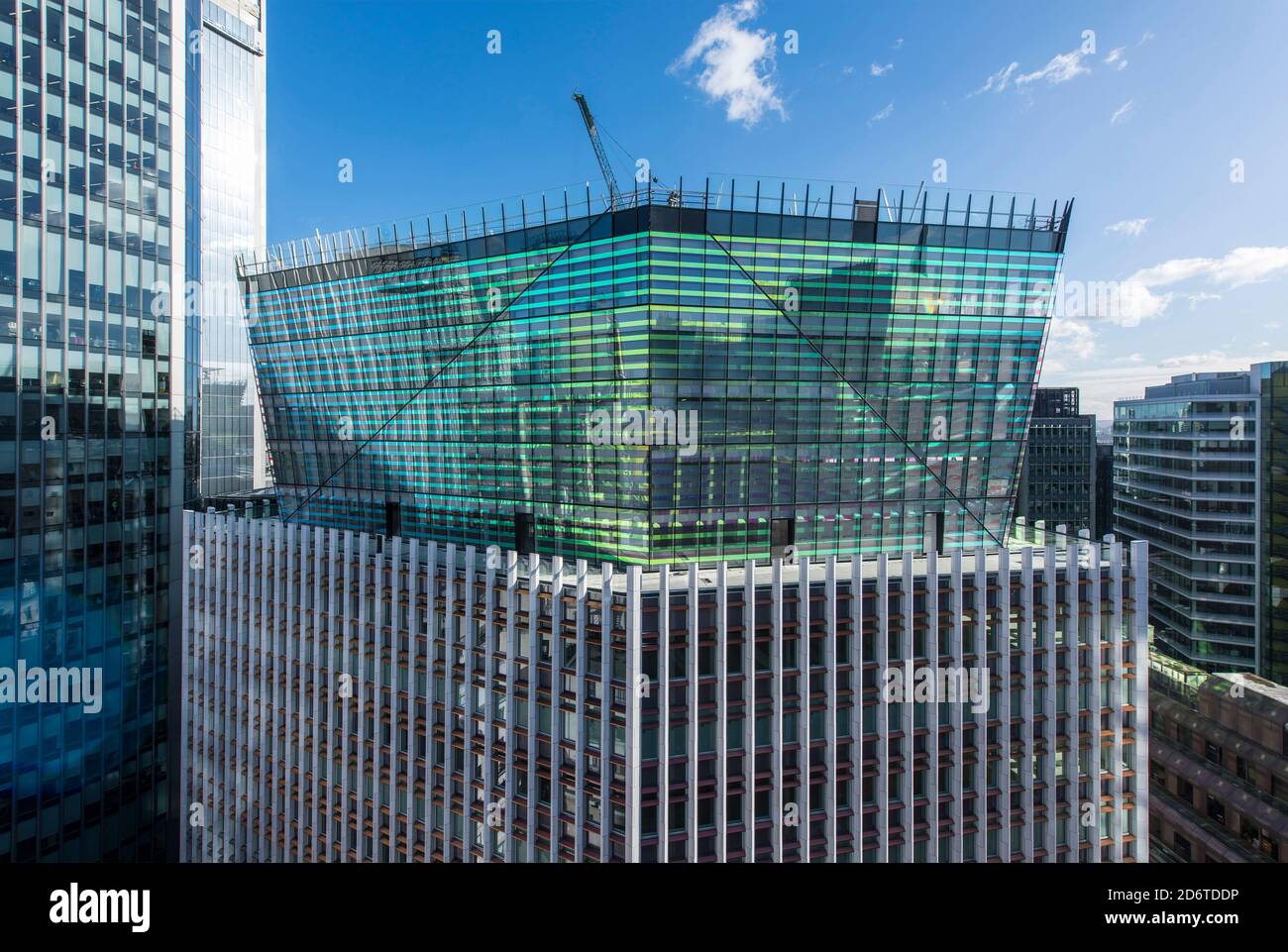 Elevated view of the crown of dichroic glass on the building, looking ...