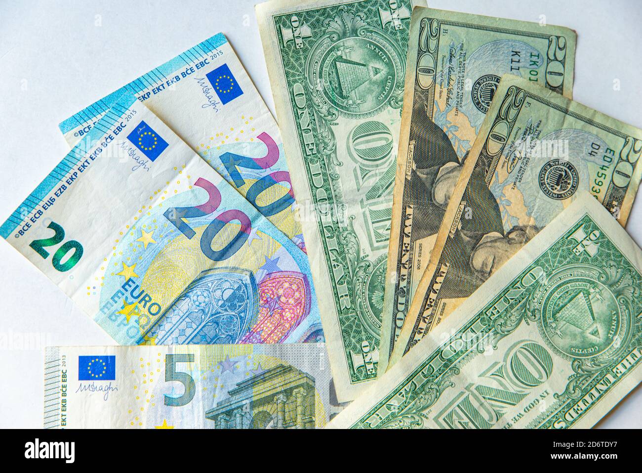 Euro banknotes and dollar banknotes next to them. Quotation and ...
