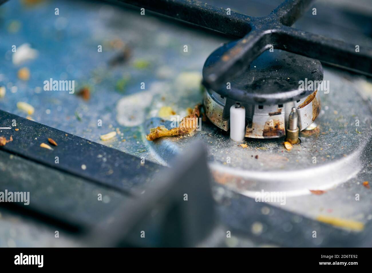 Dirty stove top with oil splatters, fat stains and food leftovers ...