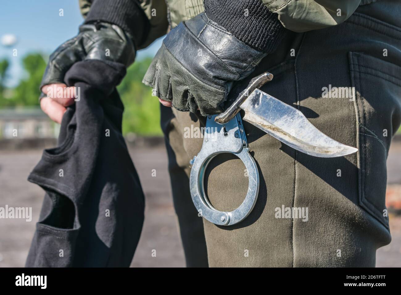 Standard military and law enforcement equipment, handcuffs and ...