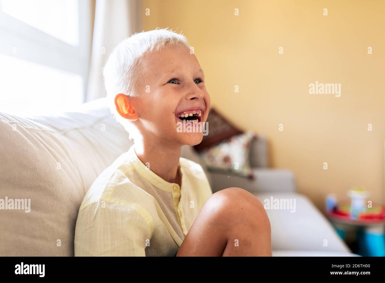 Blue content sofa relax child hi-res stock photography and images - Alamy
