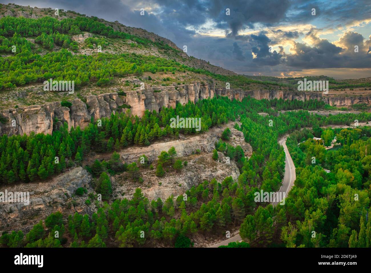 From above of spectacular landscape with curved roadway running on ...