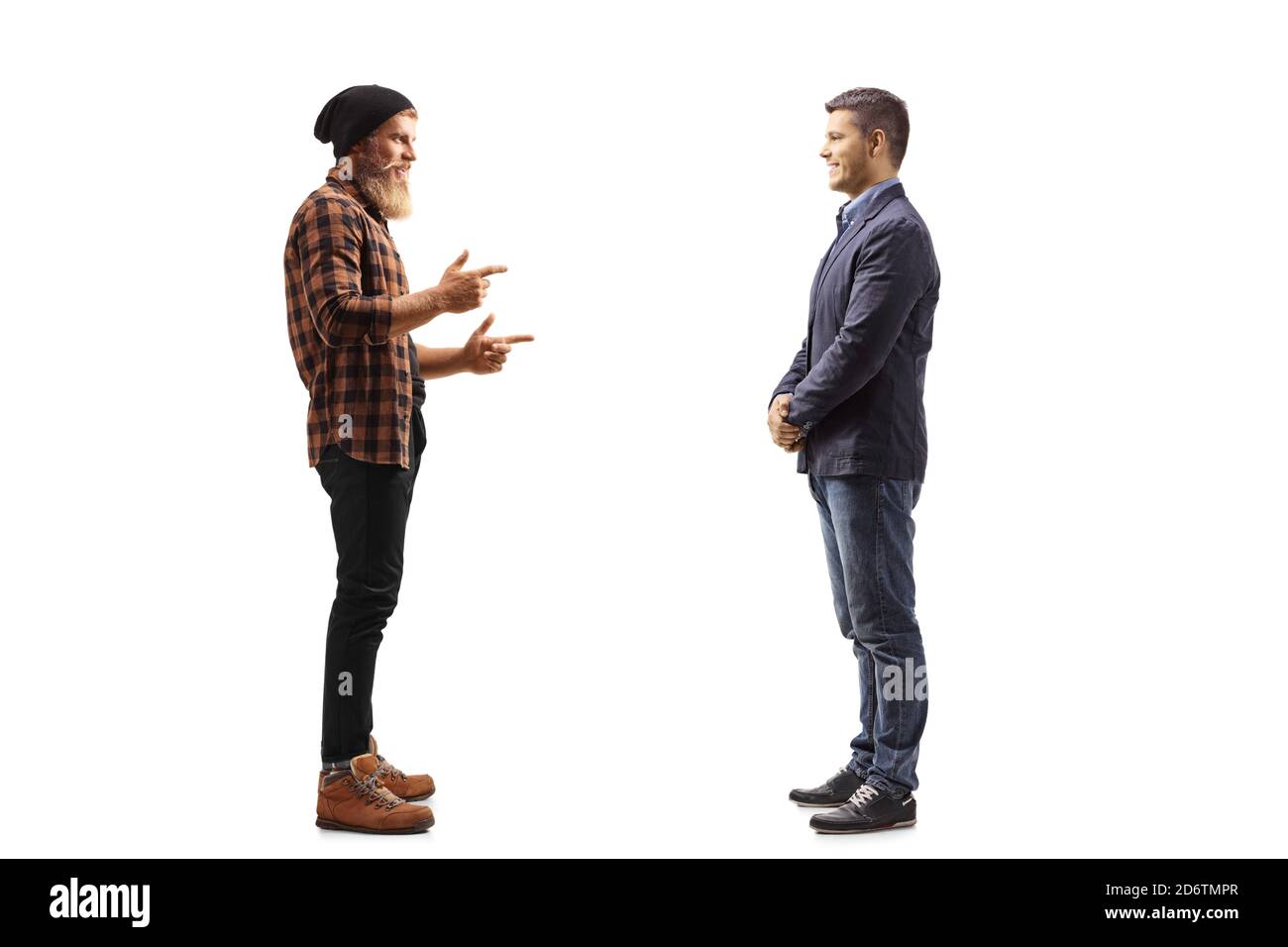 Full length profile shot of a bearded guy standing and talking to a man ...