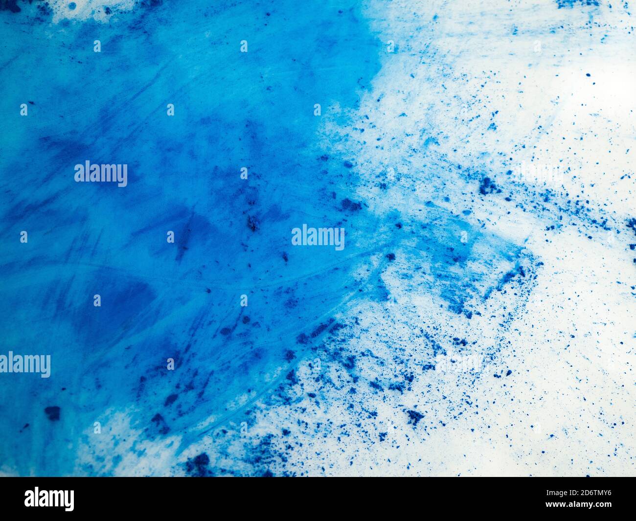 Scattered blue pigment. Abstract background. Blue powder on white ...