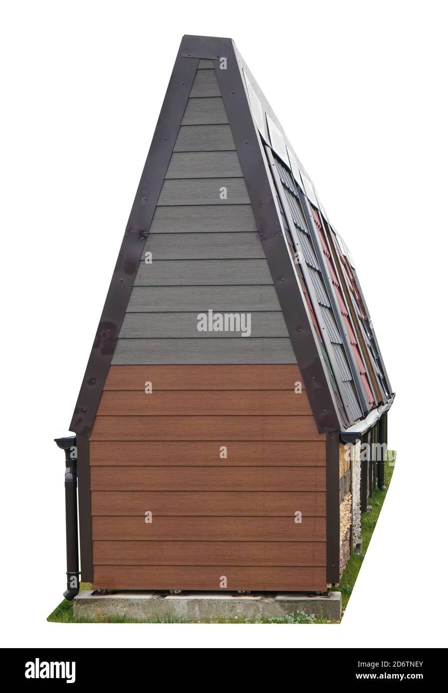 Back side of vintage style rural barn shed for storage of firewood and ...