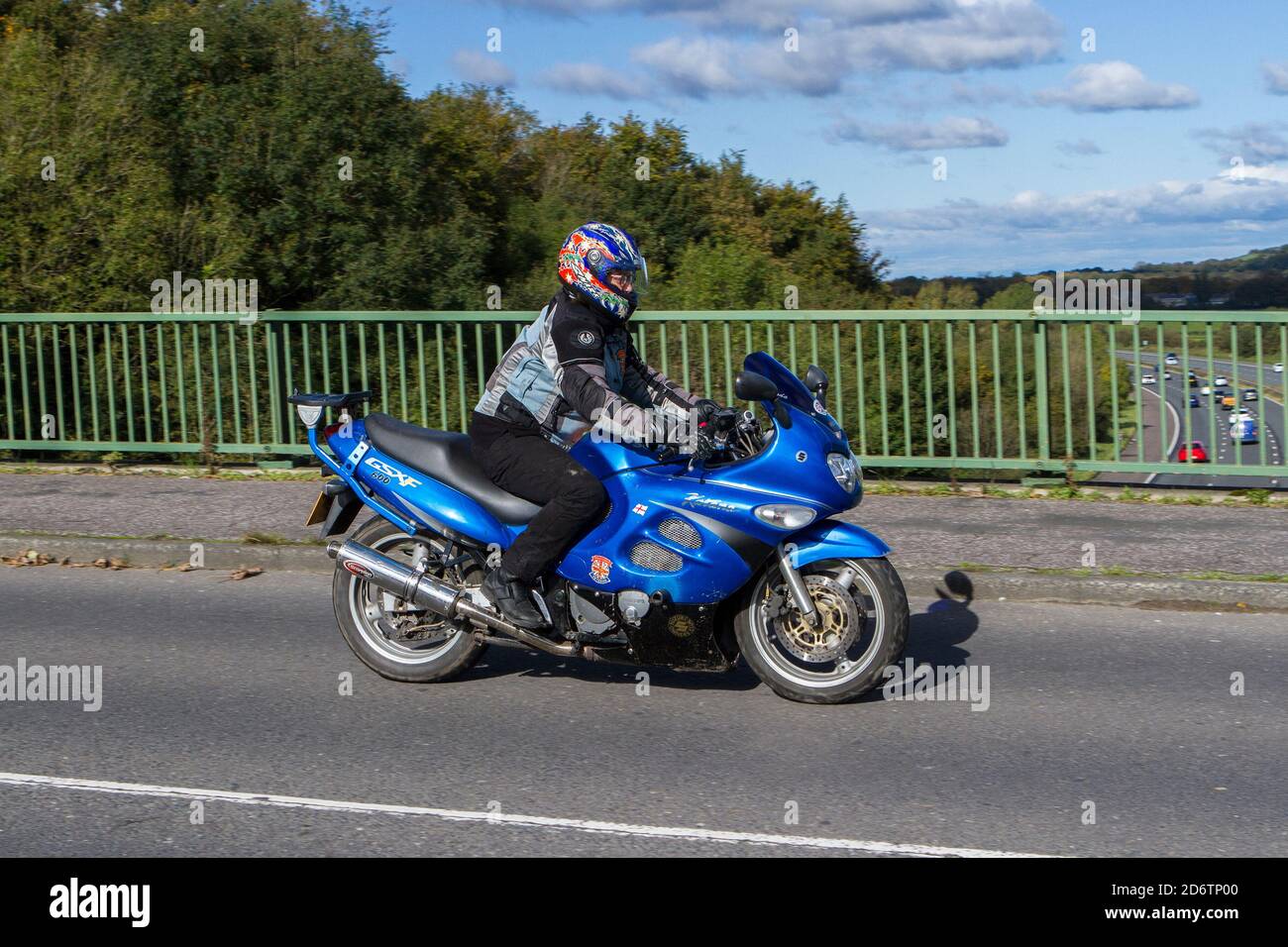 Suzuki GSX Motorbike rider; two wheeled transport, motorcycles, vehicle ...