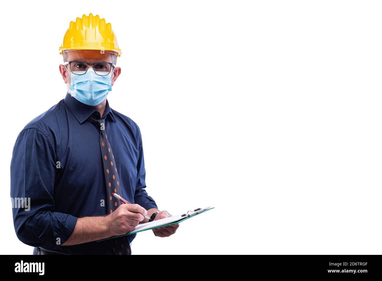Engineer isolated on white background wears surgical mask to prevent ...