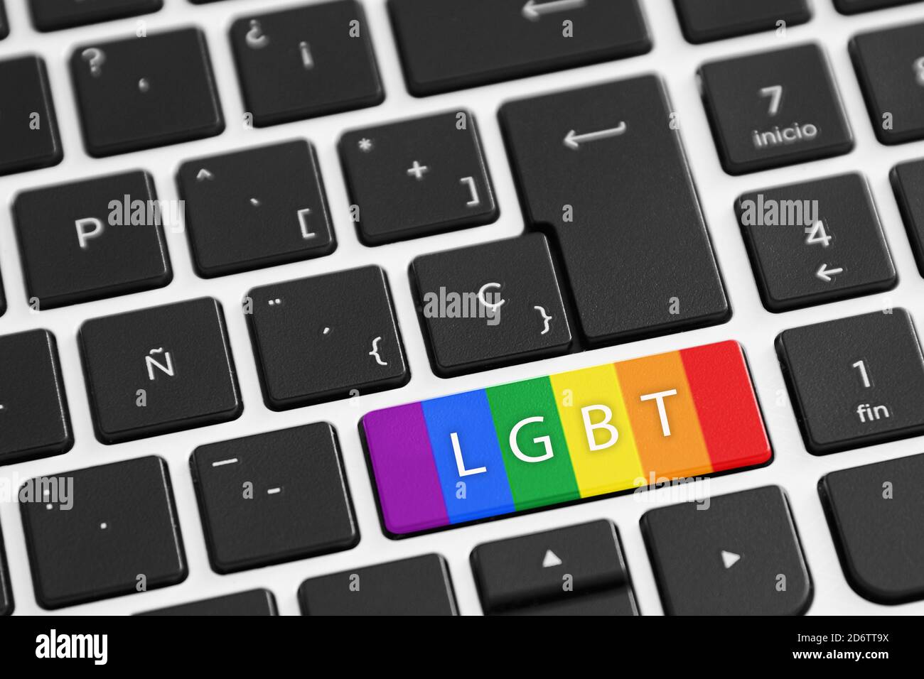 Computer keyboard with one of the keys with the LGBT flag and text ...