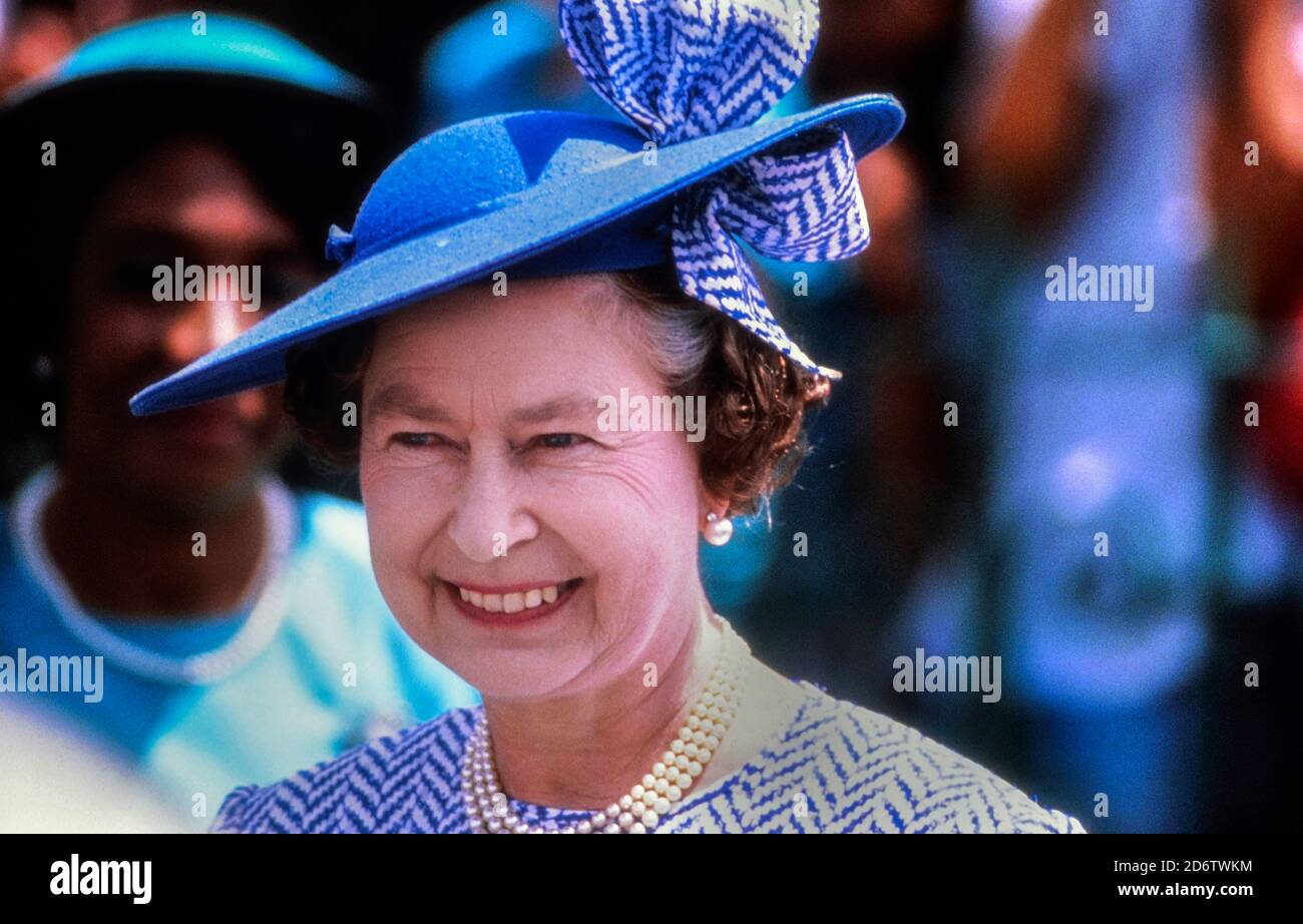 A smiling HM Queen Elizabeth II wearing a hat by Milliner Philip ...