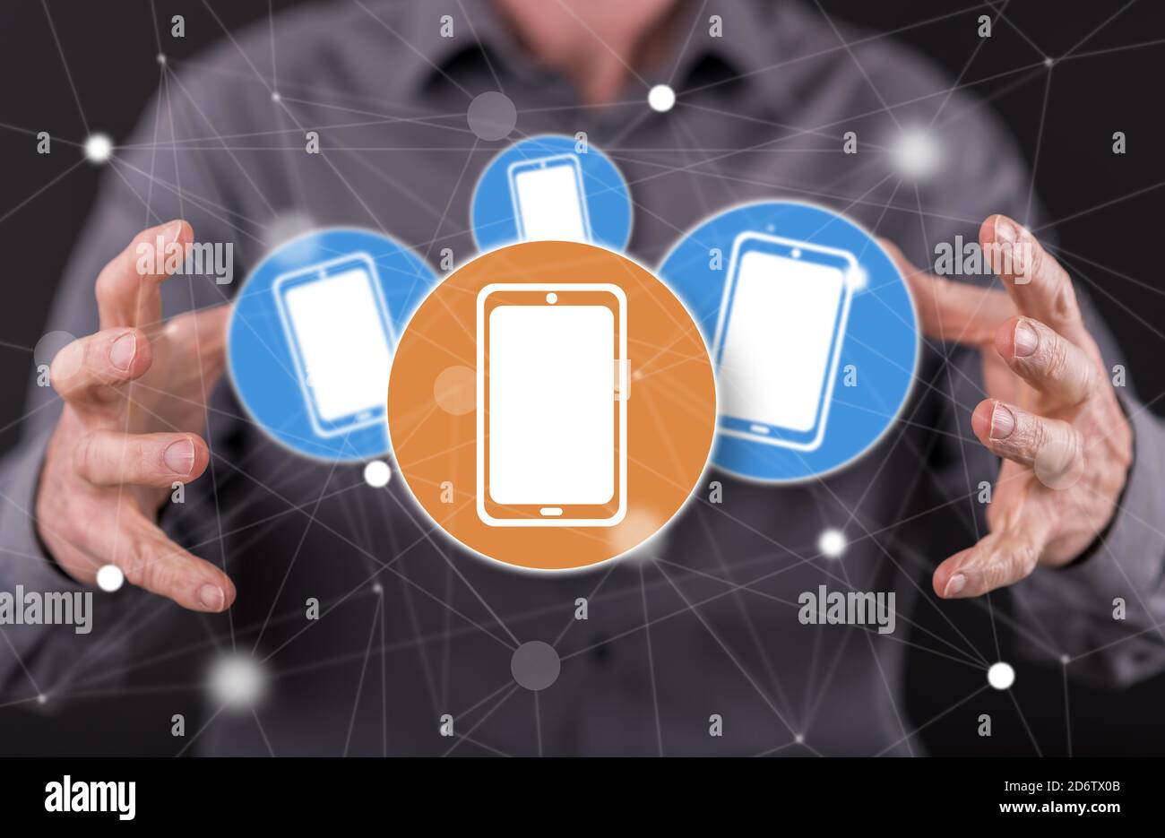 Digital communication concept between hands of a man in background ...