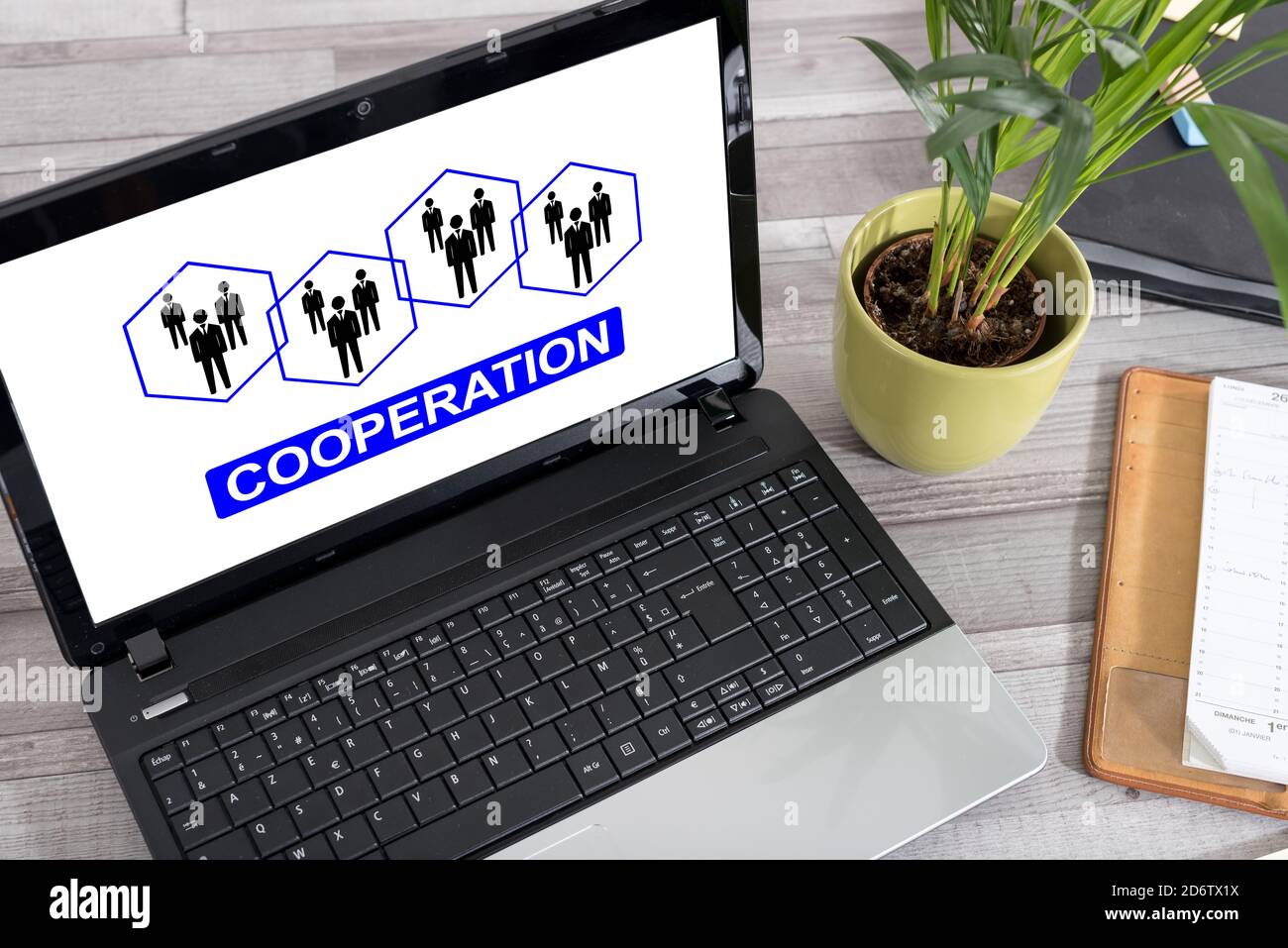 Laptop screen with cooperation concept Stock Photo - Alamy