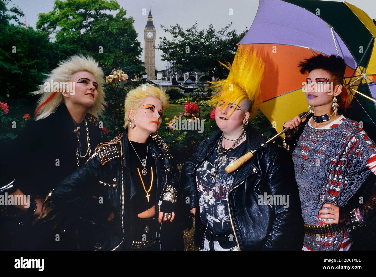 Teenage female punk rockers posing in front of The Houses of Parliament ...