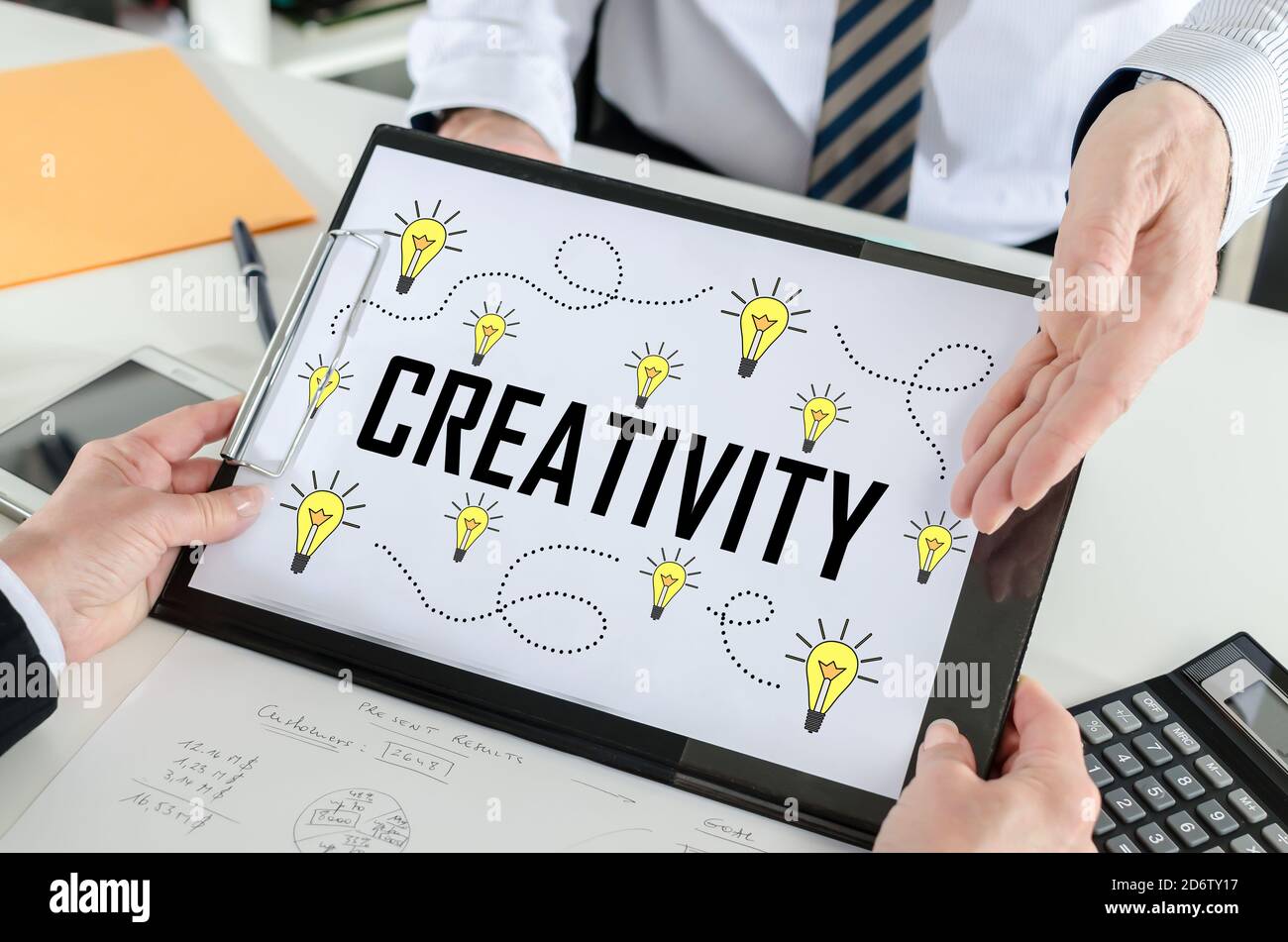 Creativity concept shown by a businessman Stock Photo - Alamy